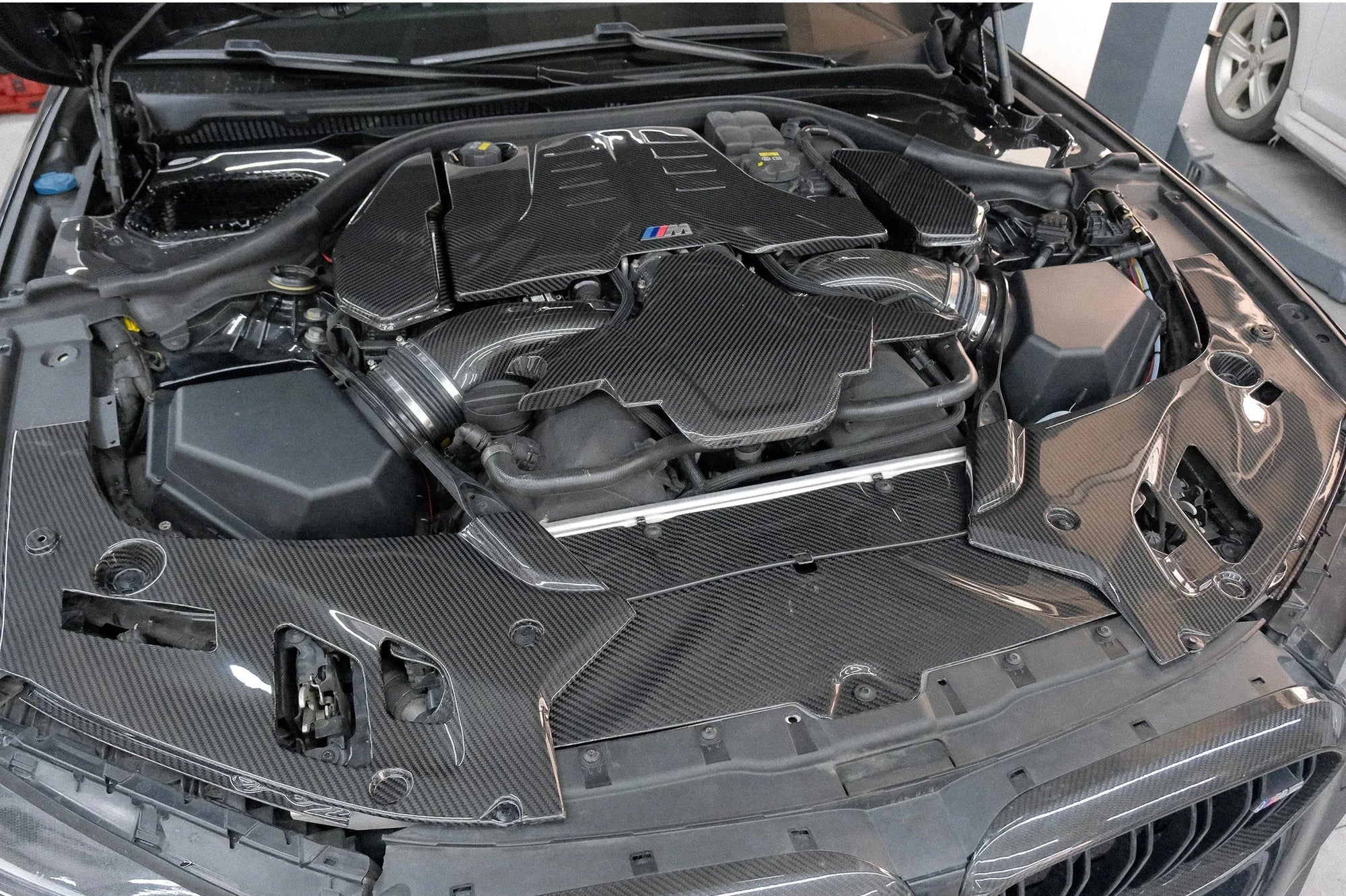 BMW F90 Carbon Fiber Engine Bay Corner Cover | Eurobahndynamics